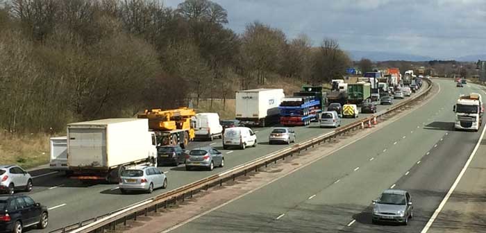 M56 incident “resolved” after man talked down from bridge - Warrington ...