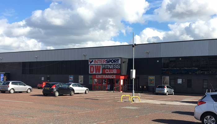 Police alerted after suspected arson incident at former gym building