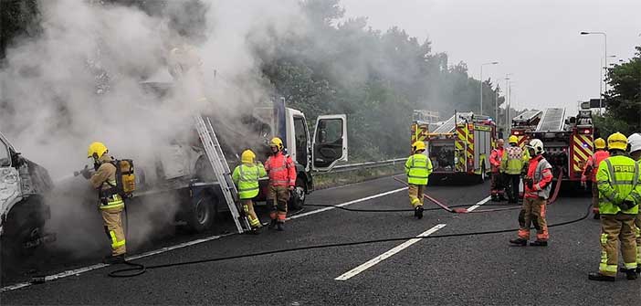 Traffic delays on M56 at Lymm as firefighters tackle blazing vehicles