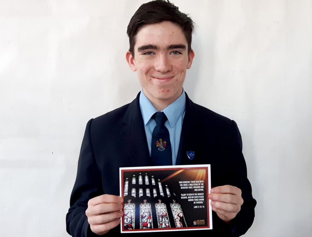 Jonah snaps his school's Christmas card