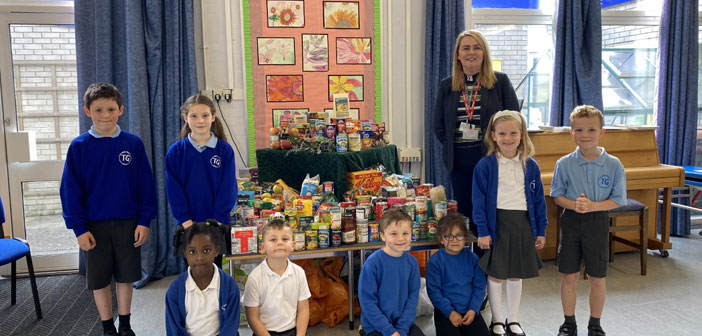 School donates Harvest Festival collection to Helping Hands ...