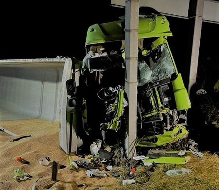 Fire crews help rescue "lucky" lorry driver from cab after collision on M56