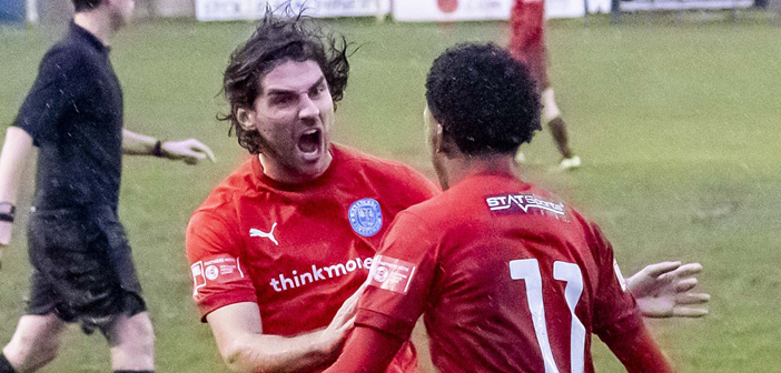 Rylands fight back to claim a point