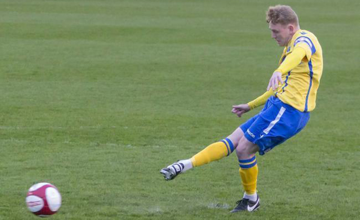 Late penalty sends Warrington Town through in FA Trophy