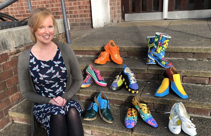 Homeless people paint their shoes to boost their confidence