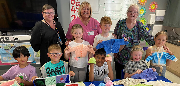 Primary knitters celebrating 10 years of keeping neonatal babies warm