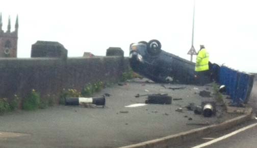 Lucky escape as car lands on pavement